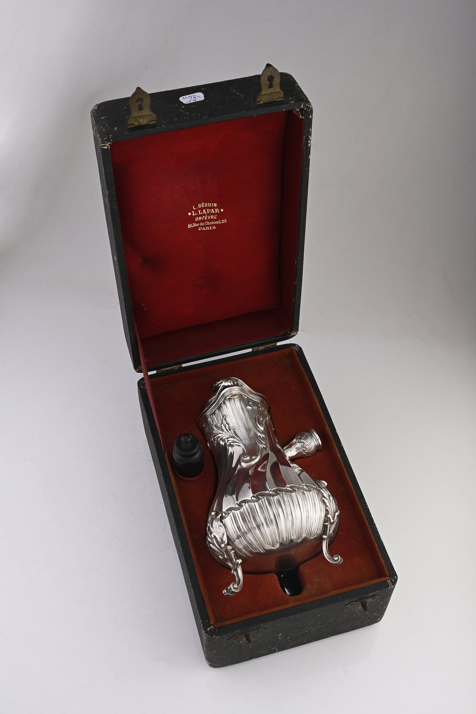 A Rocaille-style silver pitcher (950°/°°) resting on t... | Vases: bids
