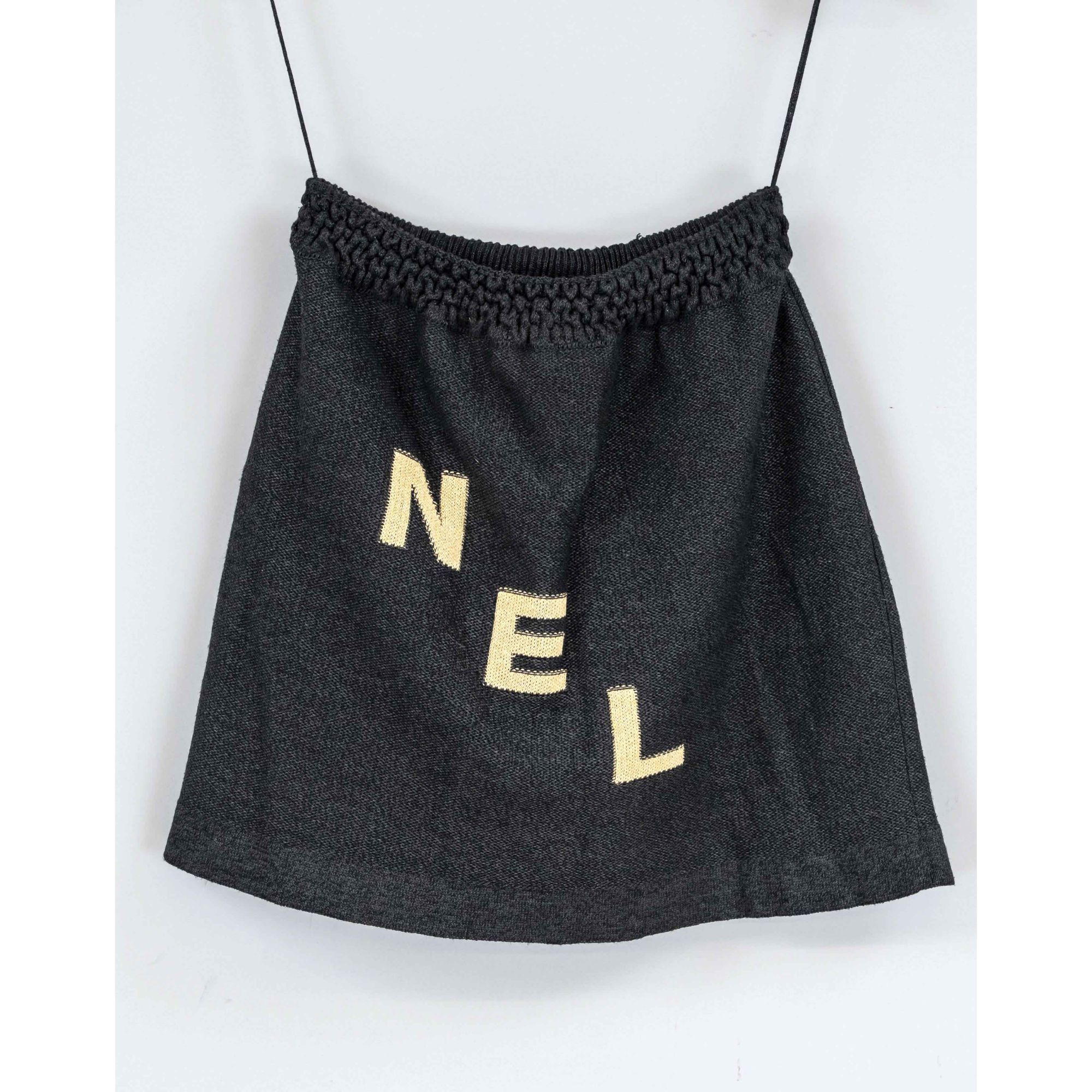 Chanel, jupe courte à pinces avec culotte inté... | Vêtements: enchères