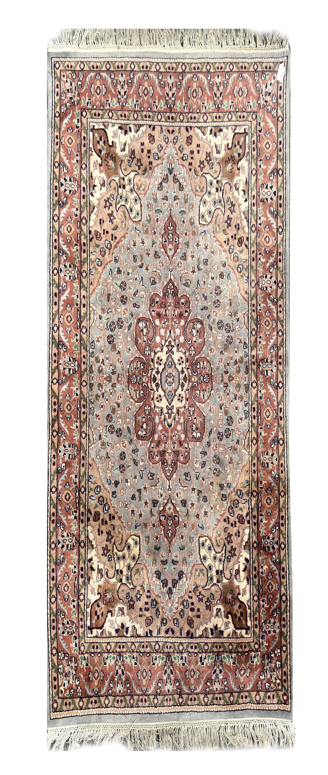 TAPIS EN LAINE PERSIENNE avec un médaillon central... | Tapis: enchères