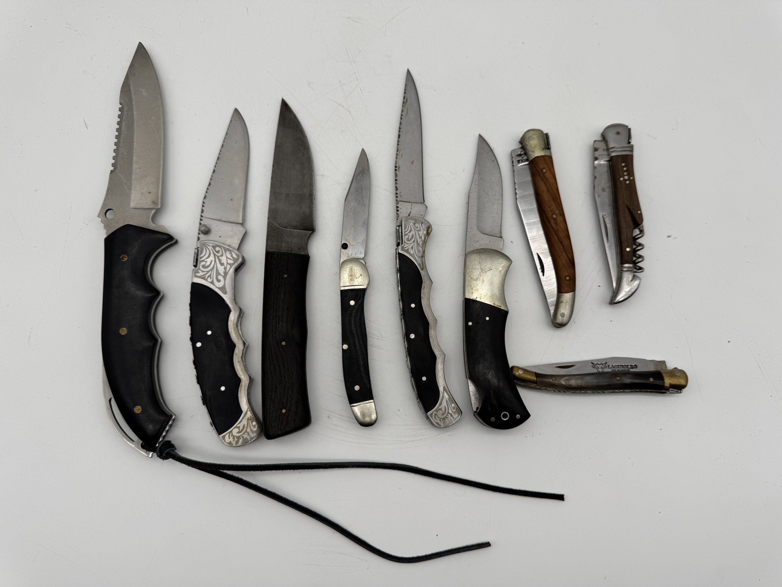 Set of 9 hunting and folding knives, including one Lagu... | Arms: bids