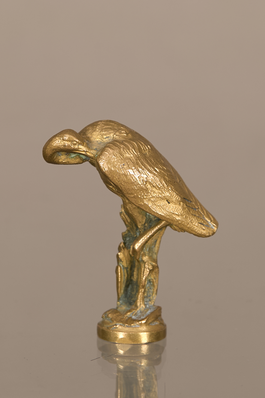Heron In bronze with a golden patina, shaped like a... | Bronzes: bids