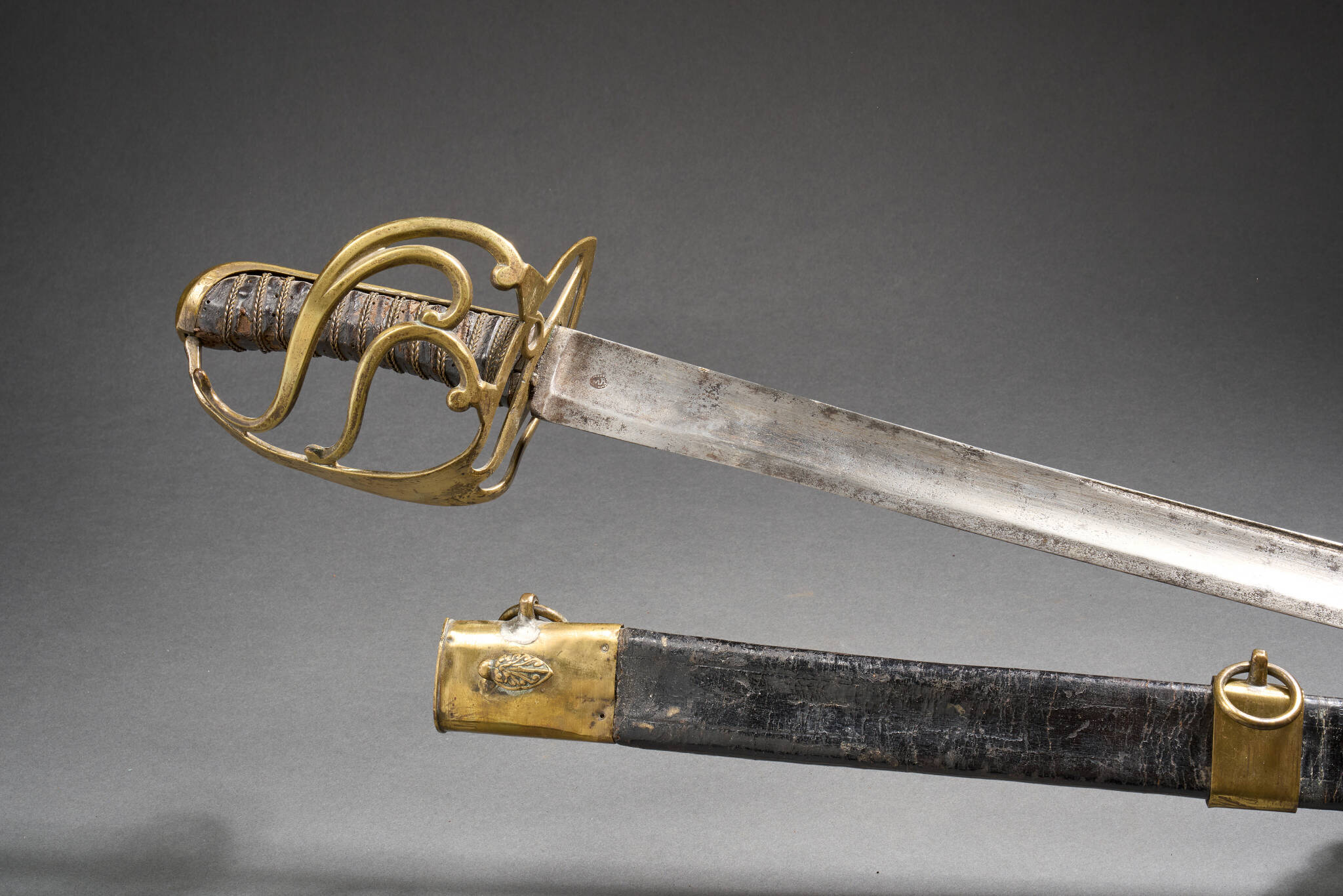 Volunteer officer's saber, known as a miner's saber.Gi... | Arms: bids