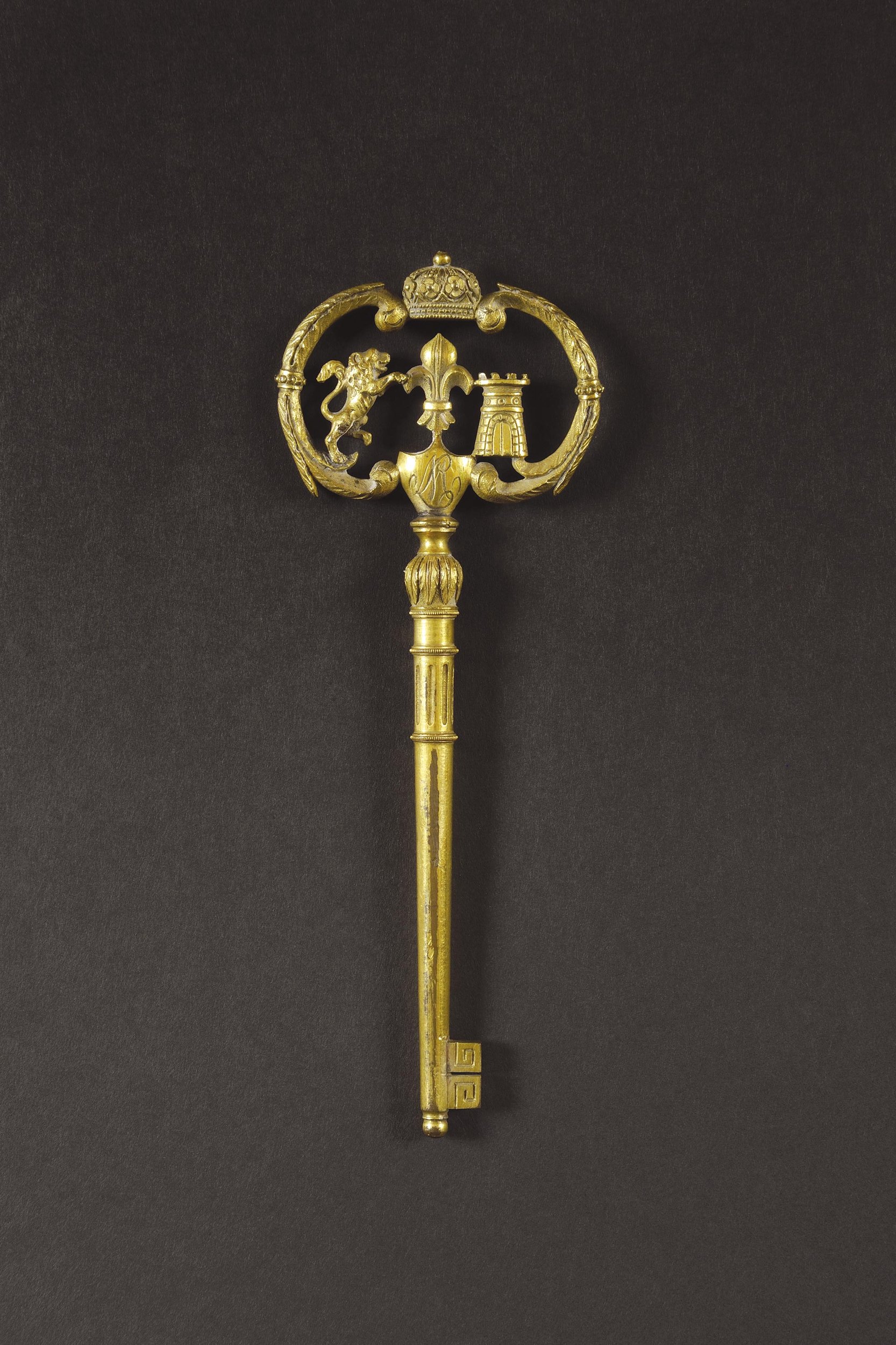 Clé de chambellan en bronze doré.An... | Médaille historique: enchères