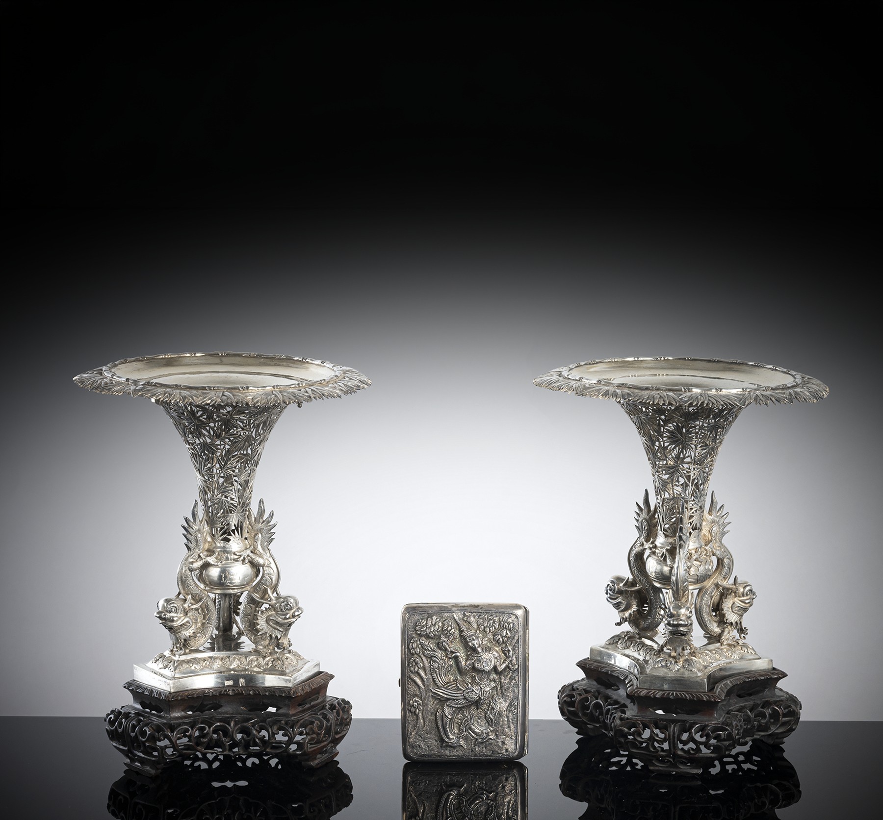 A pair of Chinese export silver compotes with dragon and bamb... | bids