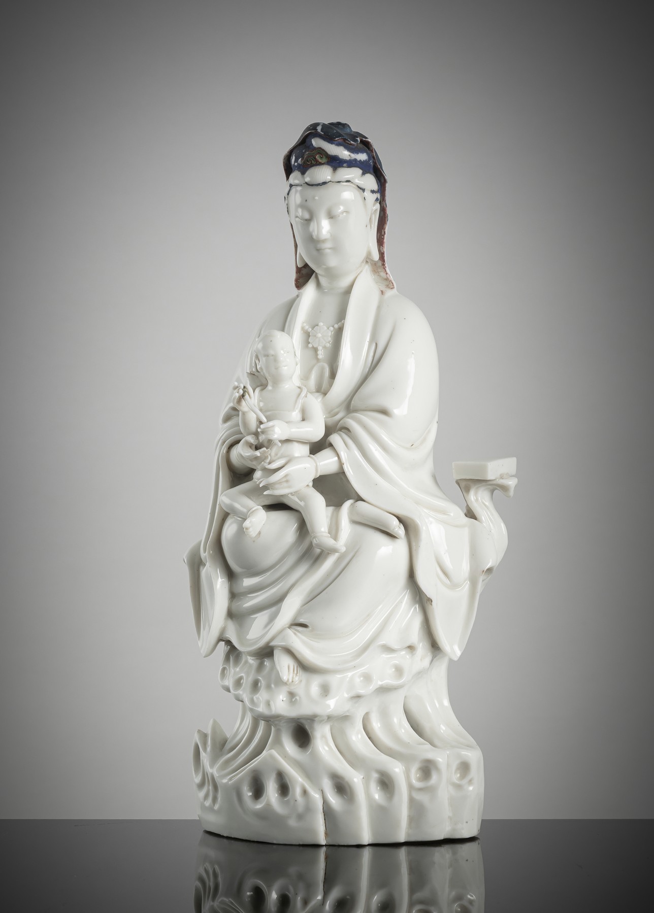 A dehua figure of a Guanyin and childChina, marke... | Asian art: bids