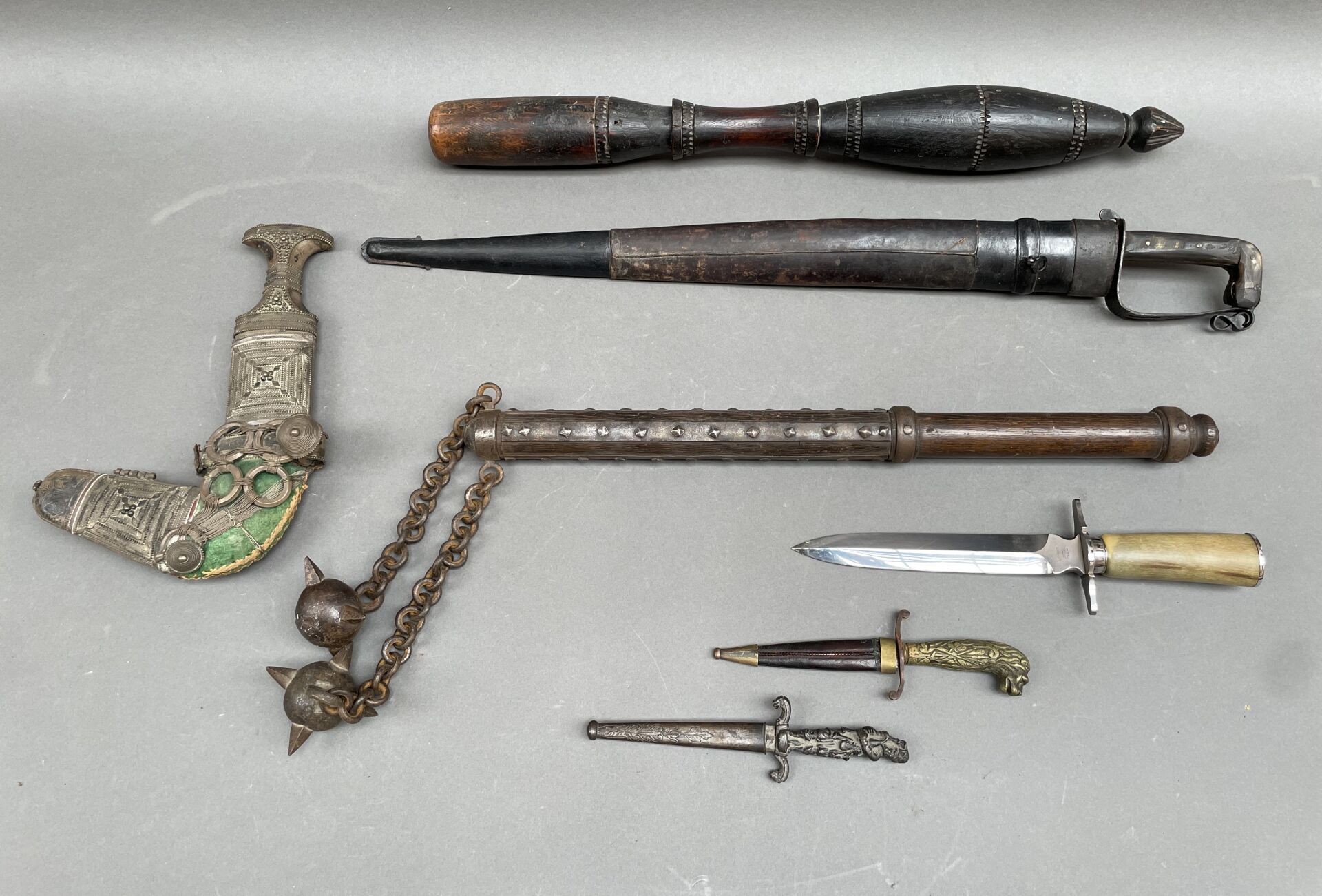 A collection of weapons of various origins and periods,... | Arms: bids